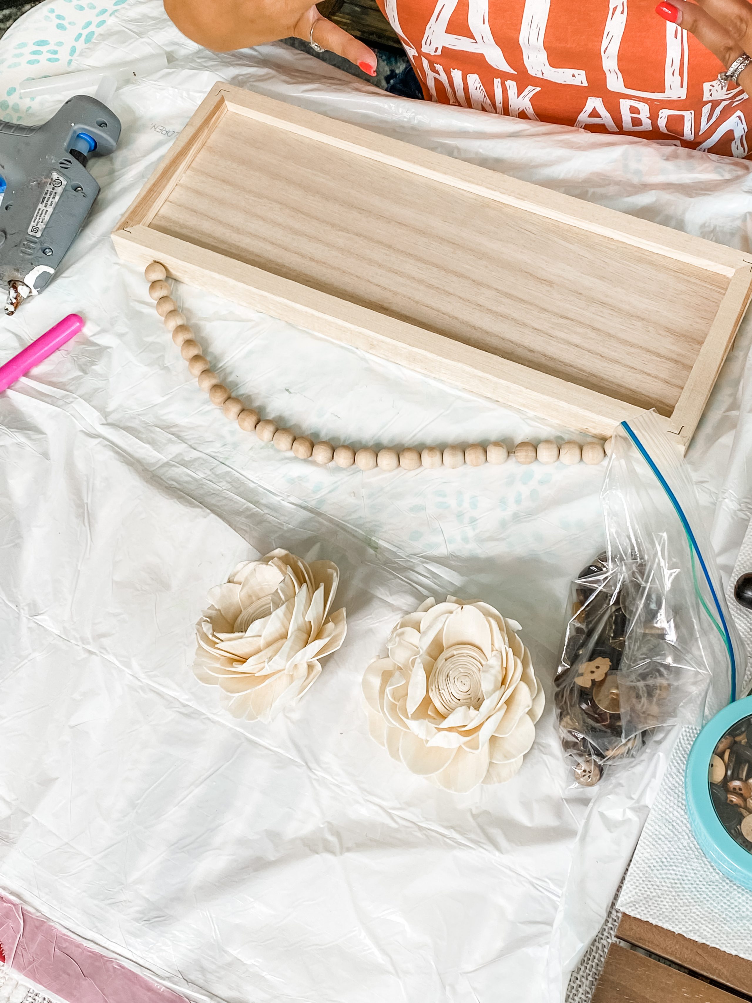 diy-wooden-bead-frame-with-hymnal-paper-and-wooden-flowers-13 - Re-Fabbed