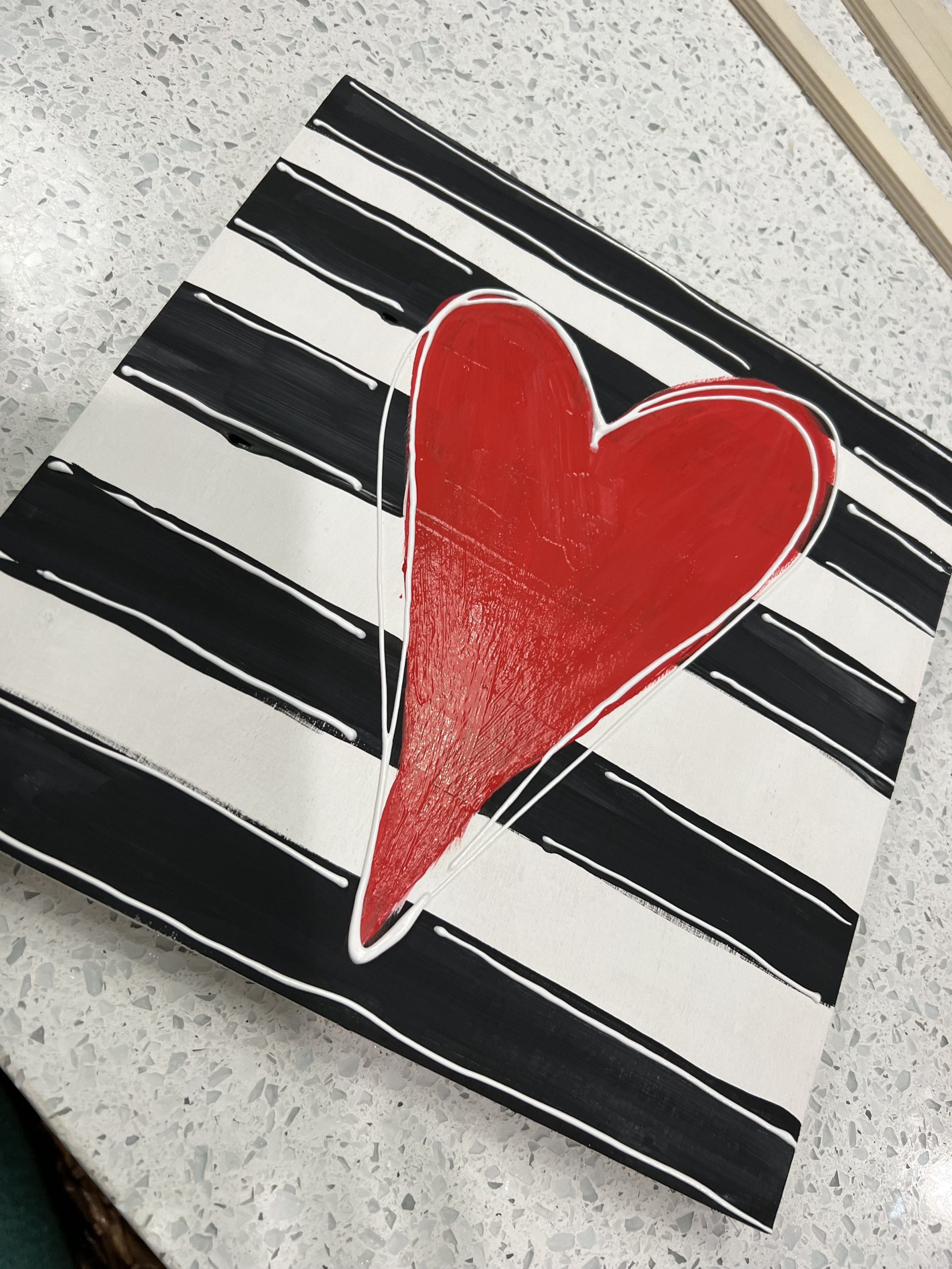 diy painted valentine heart with black and white stripes - Re-Fabbed