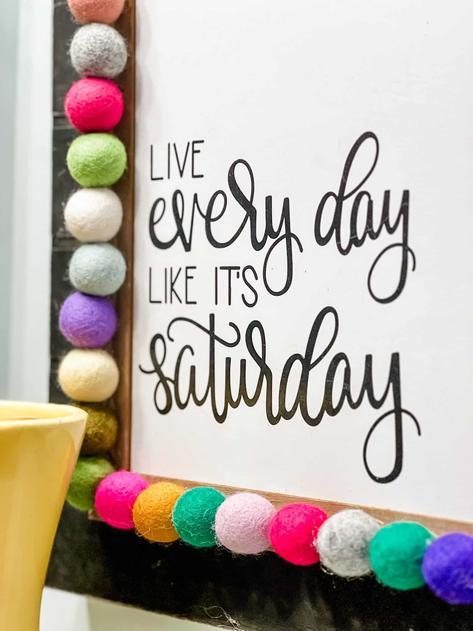 dollar general sign makeover with felt balls - Re-Fabbed